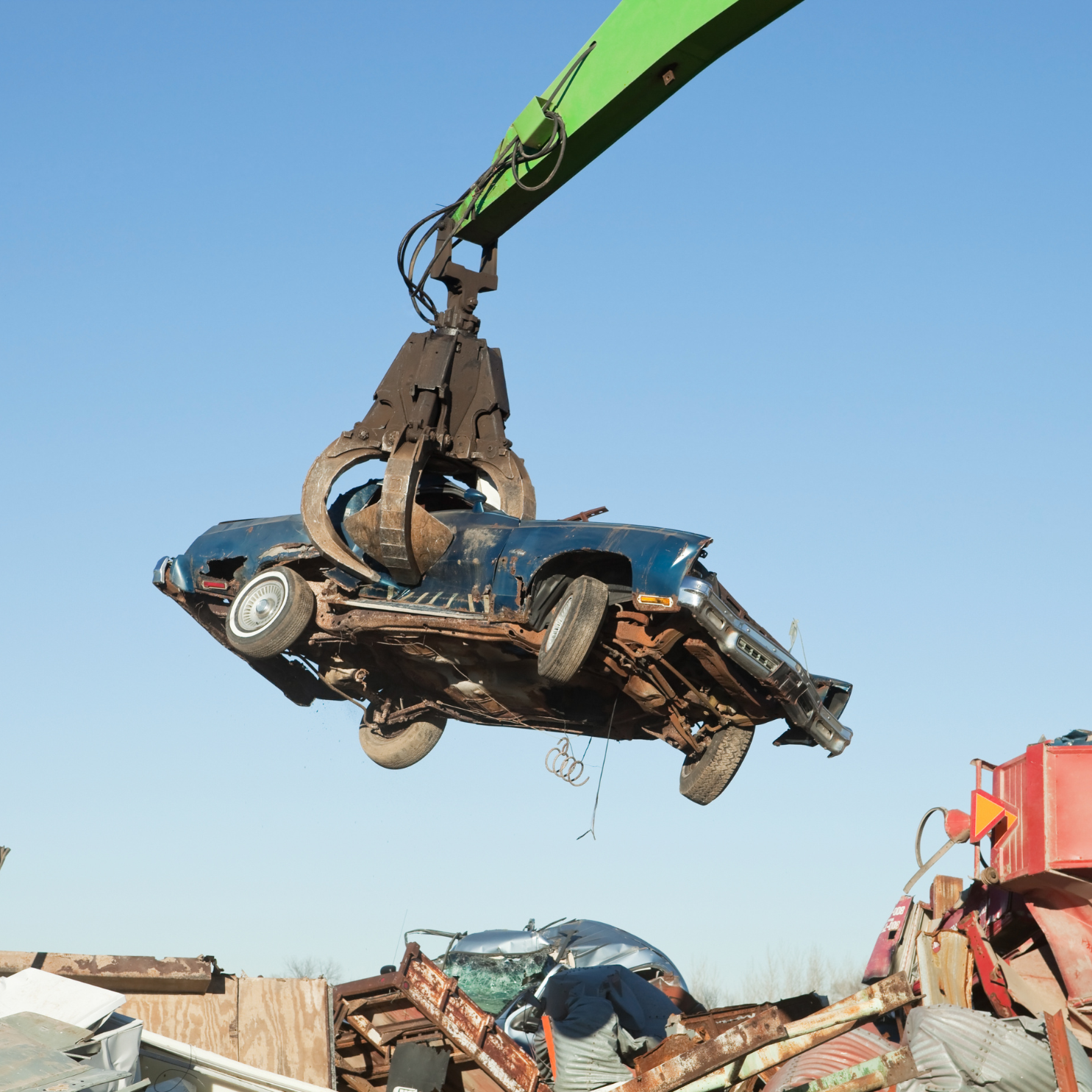Why Auto Salvage Yards Need Dump Hoppers for Scrap Metal and Auto Parts